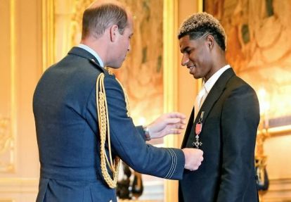 Marcus Rashford receives MBE from Prince William at Windsor Castle