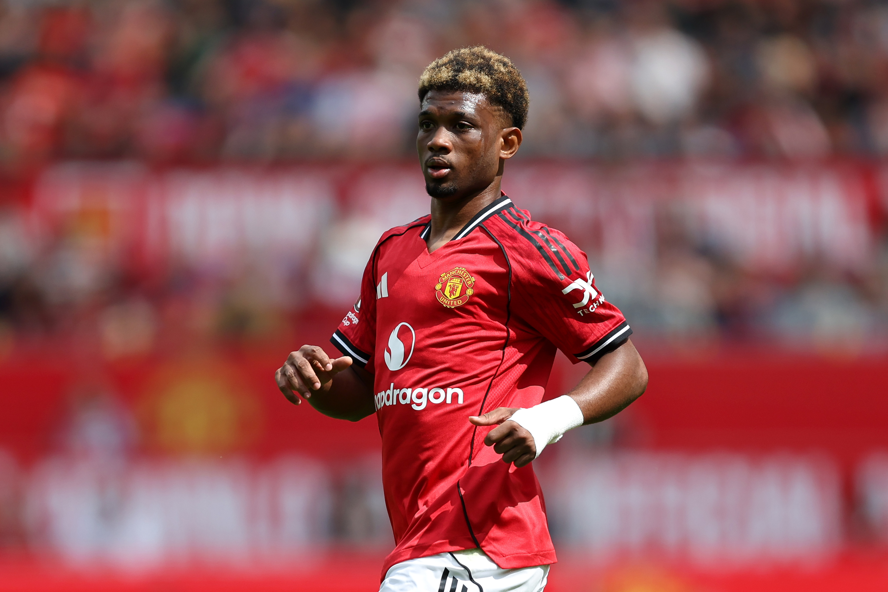 Amad Diallo & Bryan Mbeumo resume training with Man United